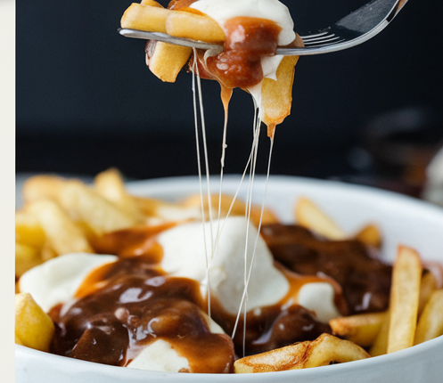 Delicious Canadian Poutine Recipe - Flavors & Frosting